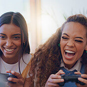 Fun, gaming and friends in living room, laughing and bonding with ...