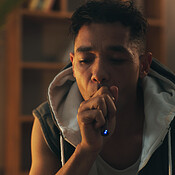 House, drug and man with vaping, relax and narcotics with mental health ...