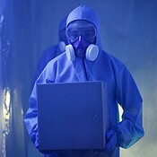 Man, suit and box for crime scene investigation with evidence, gas mask ...