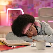 Fatigue, girl and student sleeping from studying, learning books and ...