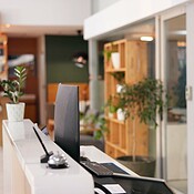 Receptionist, bell and luxury with front desk in hotel for hospitality ...