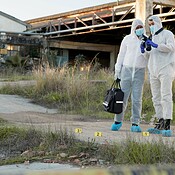 Crime scene, people and camera outdoor for forensics, evidence and ...