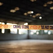 Crime scene, police tape and evidence in building for investigation ...