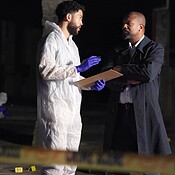 Forensics team, men and discussion at crime scene for investigation ...