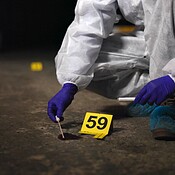 Person, swab and hands in investigation at crime scene, blood sample ...