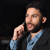 Police, man and talking with phone call for communication, crime scene ...