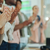 Employees, hands and clapping in office for success, team building and ...