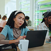 Research, thinking and laptop with woman in study lounge for education, elearning and college ...