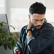 Business, computer and man in office, neck pain and muscle tension with ...