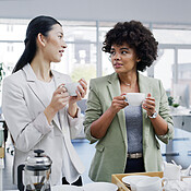 Business women, coffee break and office with talk, gossip and teamwork ...