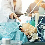 Hospital, training and mannequin with healthcare mentor and nursing ...