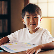 Portrait, Japanese and child with education at house of homework ...