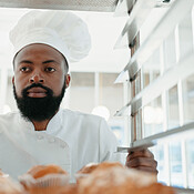 Muffin, bakery and cafe with man in kitchen for coffee shop, food ...