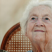 Thinking, senior woman and relax at retirement home for past life, nostalgia and remember with ...