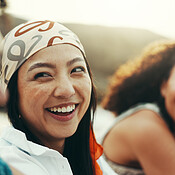 Friends, laughing and relax on beach outdoor of travel reunion, summer ...