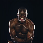Portrait, black man and flex for bodybuilding in studio for strong ...