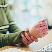 Hands, woman and wrist pain with keyboard in office for arthritis ...