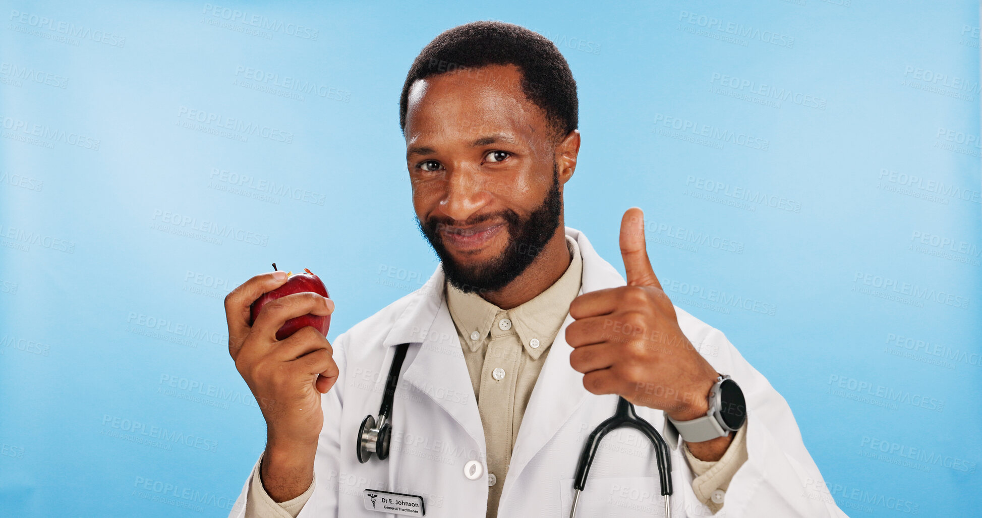 Thumbs up, doctor and black man with apple in portrait for fibre ...