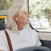 Bus, thinking and business woman by window for journey, commute and ...