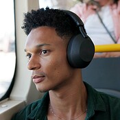 Bus, thinking and man with headphones for journey, commute and travel ...