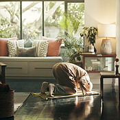 Muslim, man and bow in islamic prayer at house for spiritual worship ...