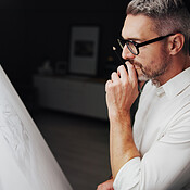 Drawing, sketch and man with paper thinking for design, property ...
