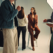 Conversation, photography and tablet with people in studio together for ...