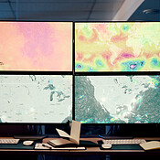 Computer, screen and data with map, control room and broadcast for news ...