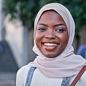 Muslim, girl and portrait on campus at university with smile, backpack ...