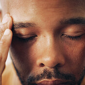Man, face and headache in home with pressure, tension and stress for ...