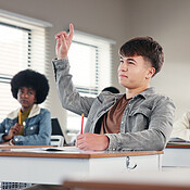 Question, hands up and boy in classroom with answer for lesson ...