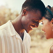 Couple, happy and touch forehead on safari with connection, love and ...