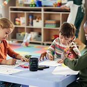 Paper, kindergarten and drawing with kids in classroom for child ...