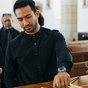 Sad, man and rose at funeral for farewell service, mourning death and ...