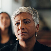 Funeral, crying and woman in church, thinking and praying for loss ...