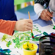 Education, hands and children with painting for kindergarten ...