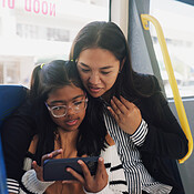 Travel, mom and child with phone, bus and watching movies with tech ...