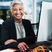 Portrait, woman and developer with computer in office for programming ...
