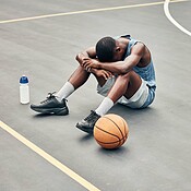 Tired, depression or sad basketball player with training gear after ...