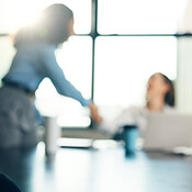 Handshake, meeting and blur of business people in office for teamwork ...