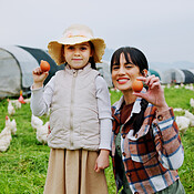 Portrait, farming and mother with girl, egg and agriculture with ...