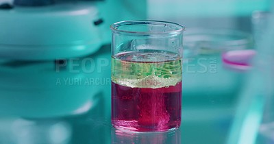 Closeup of a blood sample on glass plate under microscope lense ...