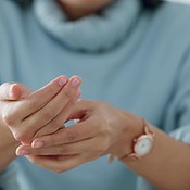 Young woman cracks her fingers on her hands, anxiety and nervous ...