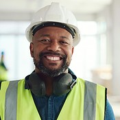 Portrait, smile and construction worker working, building and doing ...