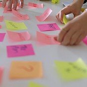 Hands, sticky notes and team brainstorming for marketing strategy and ...
