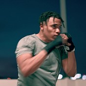 Black man, boxing and fitness on rooftop at night for strong body ...