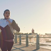 Fitness, muslim woman and running for exercise, cardio workout or ...