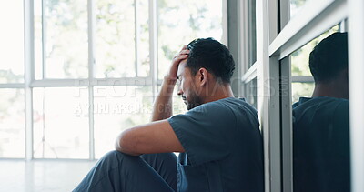 Nurse, stress or depression man on hospital floor in virus death ...