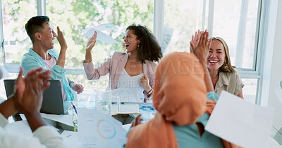 Applause, winner or high five with a business team throwing documents ...