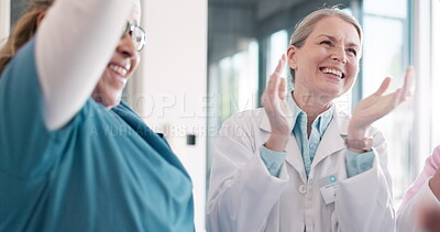 Senior nurse, applause and healthcare team to celebrate success or employees support in hospital ...